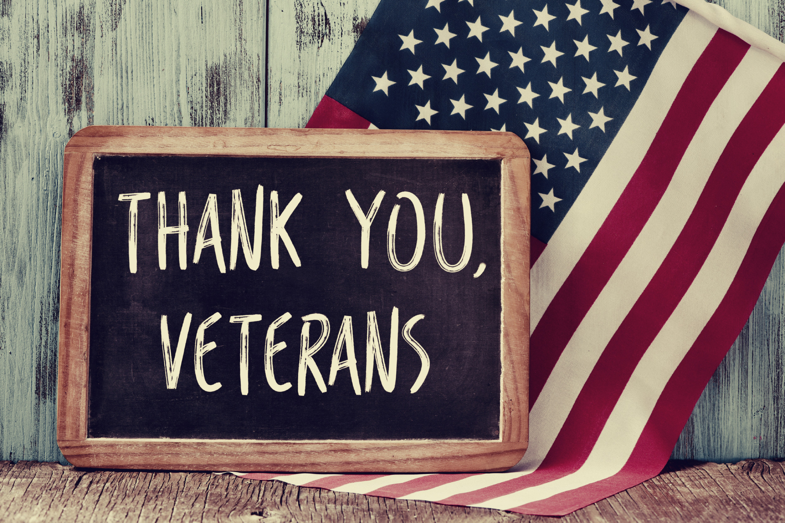Text Thank You Veterans In A Chalkboard And The Flag Of The US BCS